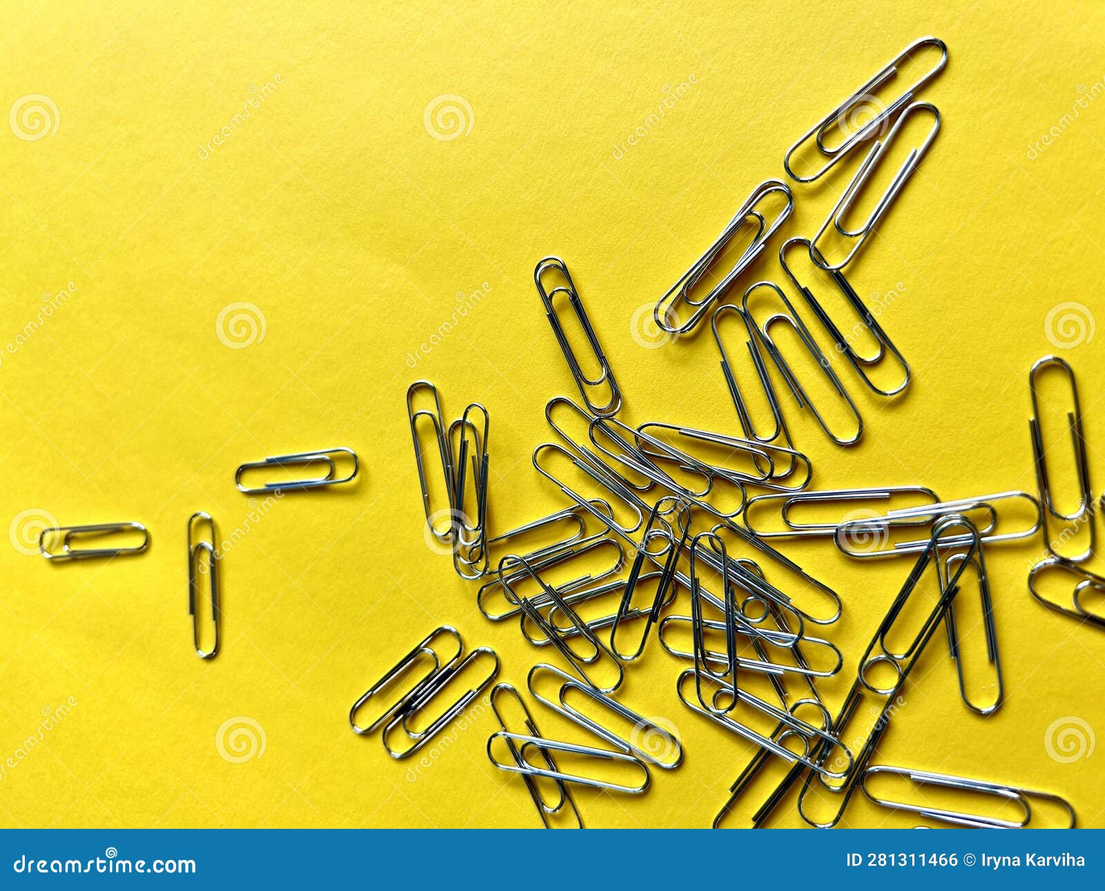 Paper Clips on Yellow Background Stock Photo - Image of cartoon, yellow ...