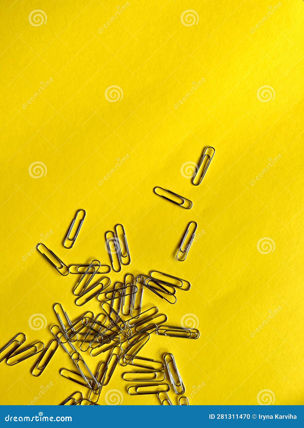 Paper Clips on Yellow Background Stock Photo - Image of design ...