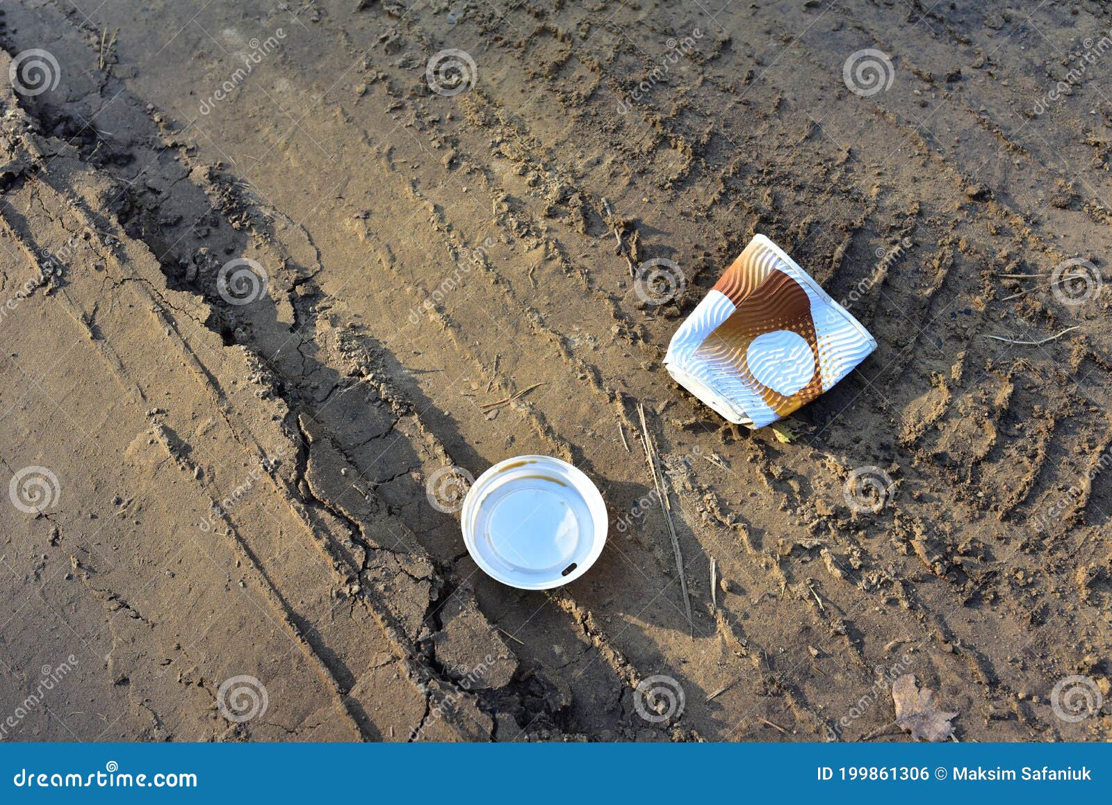 Paper Coffee Cup on Ground. Discarded Disposable Coffee Cup with a ...
