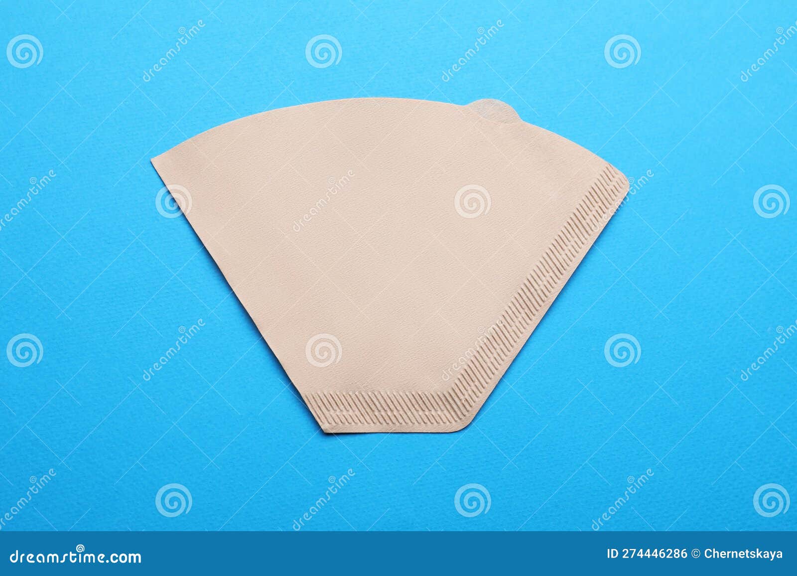 Paper Coffee Filter on Light Blue Background, Top View Stock Photo ...