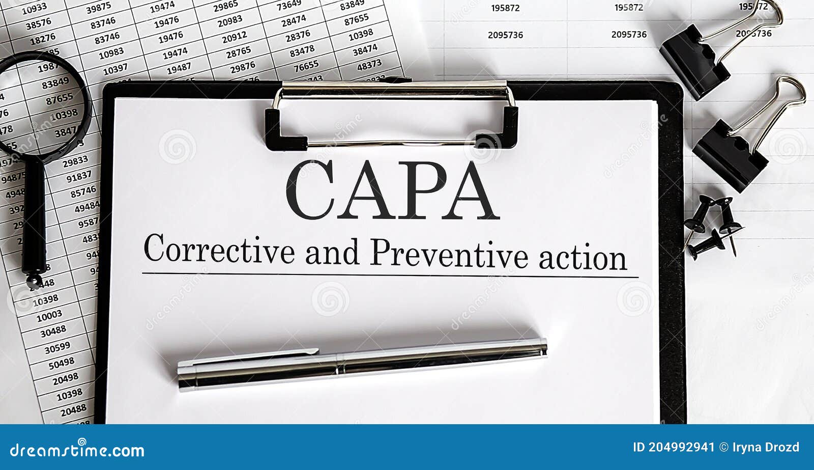 Paper with Corrective and Preventive CAPA Action Plans on a Table Stock ...