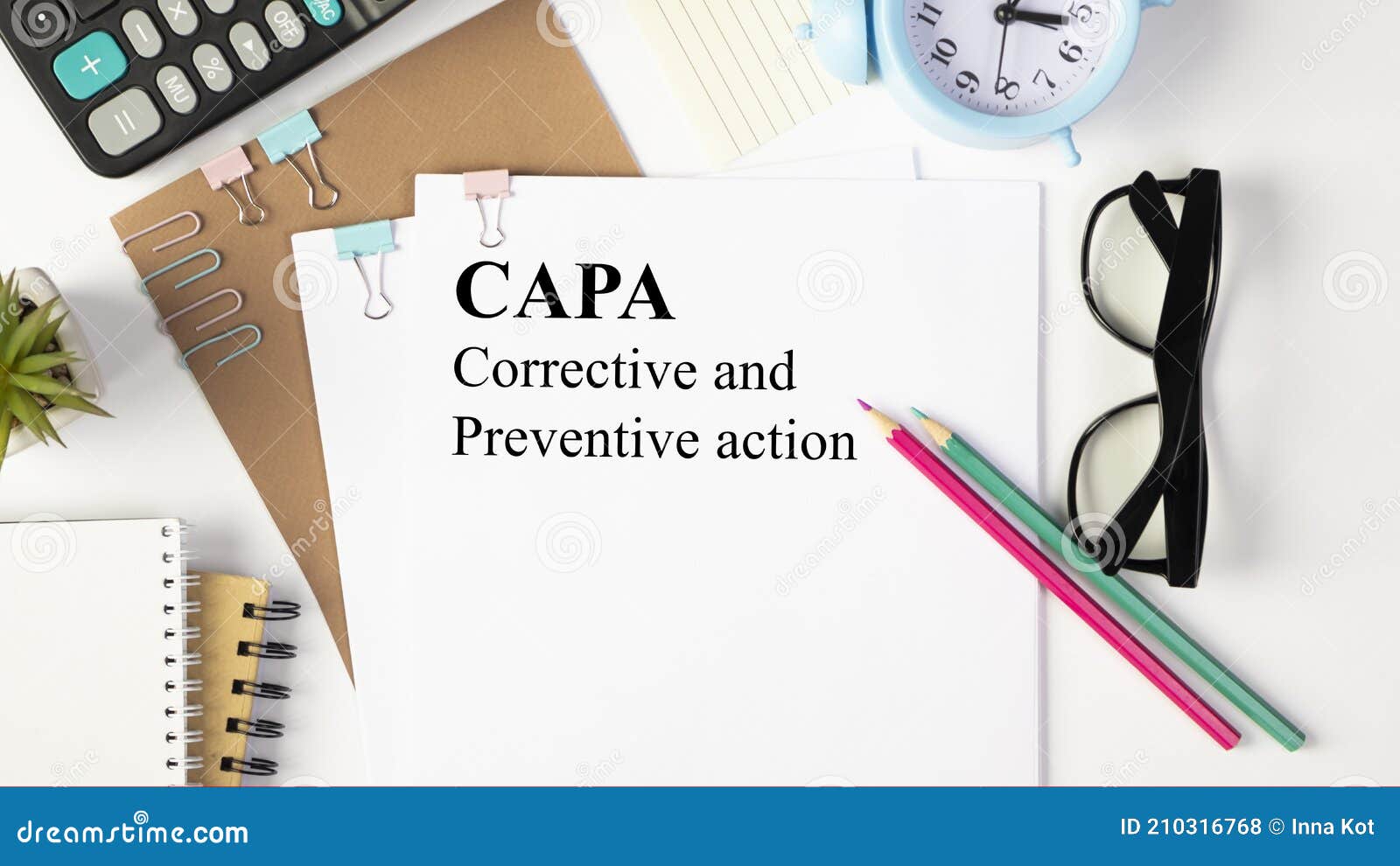 Corrective and Preventive CAPA Action Plans on a Table Stock Photo ...