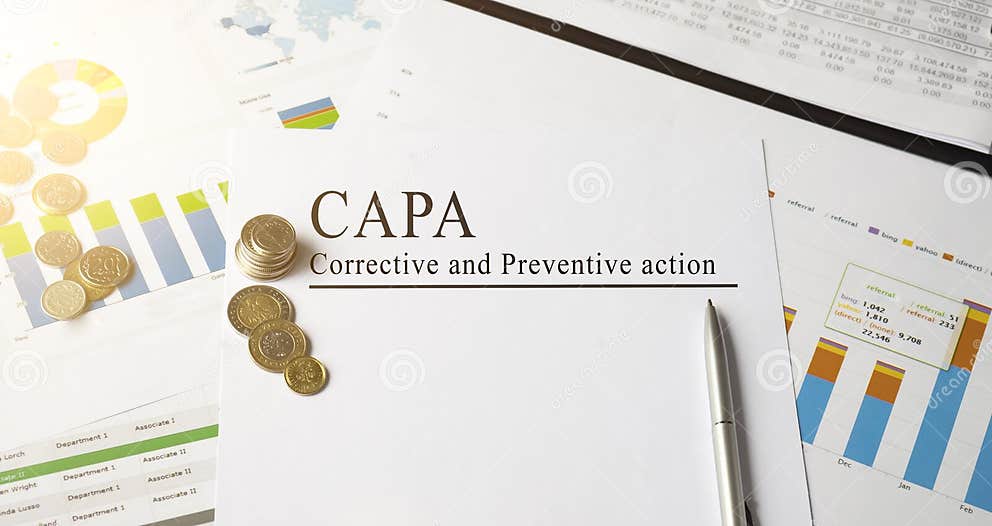 Corrective and Preventive CAPA Action Plans on a Table Stock Photo ...