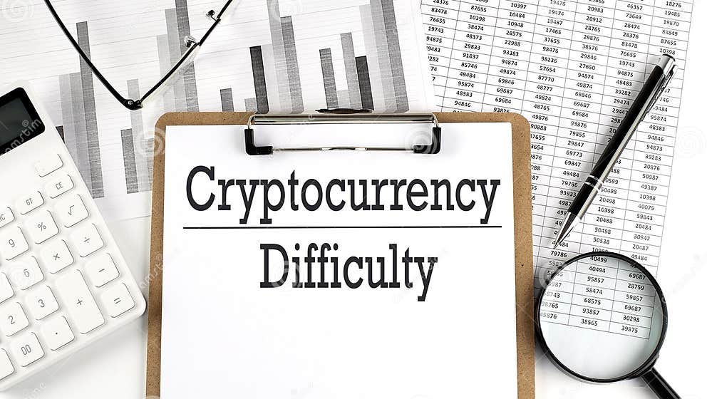 Paper with CRYPTOCURRENCY DIFFICULTY Table on Charts, Business Concept ...