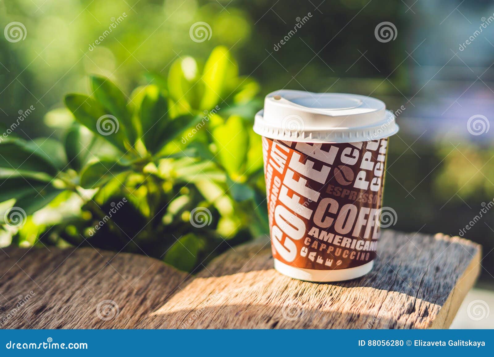A Paper Cup with Coffee on an Old Wooden Background Stock Photo - Image ...