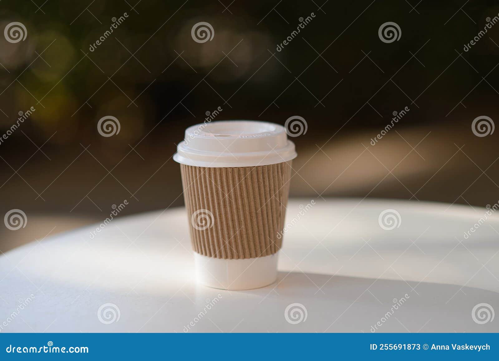Paper Cup with a Hot Drink Stands on a White Table in a Cafe Stock ...
