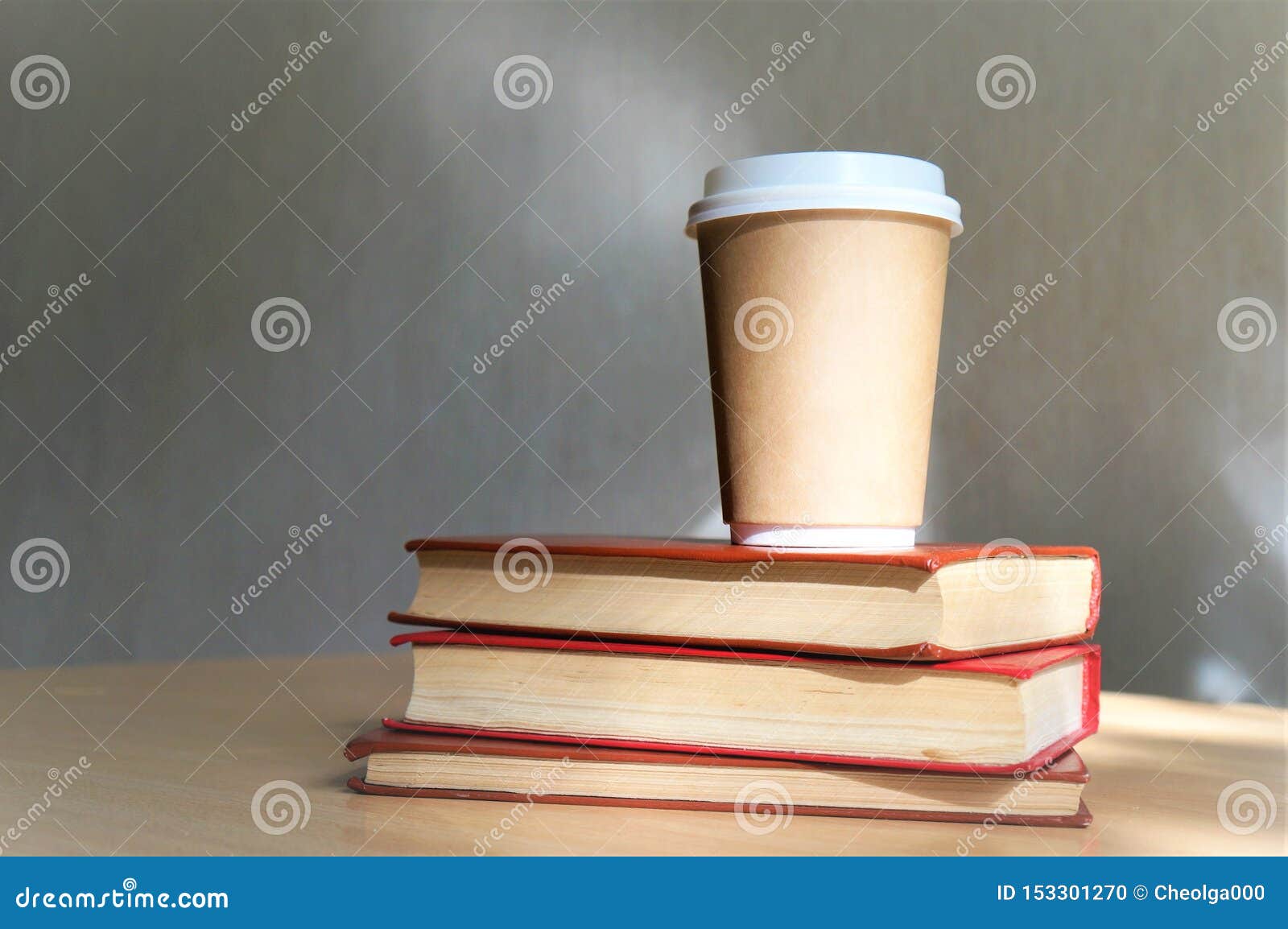 Paper Cup is a Stack of Books Stock Photo - Image of expertise, college ...