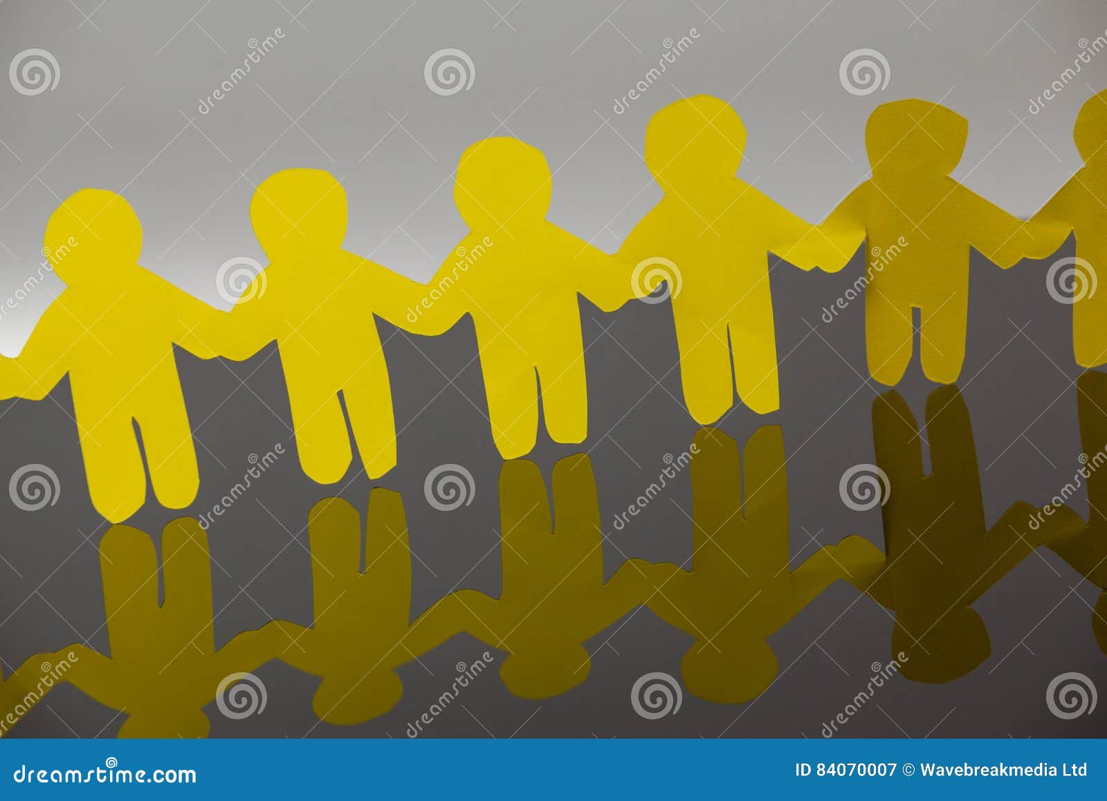 Paper Cut Outs Forming a Human Chain Stock Image - Image of human ...
