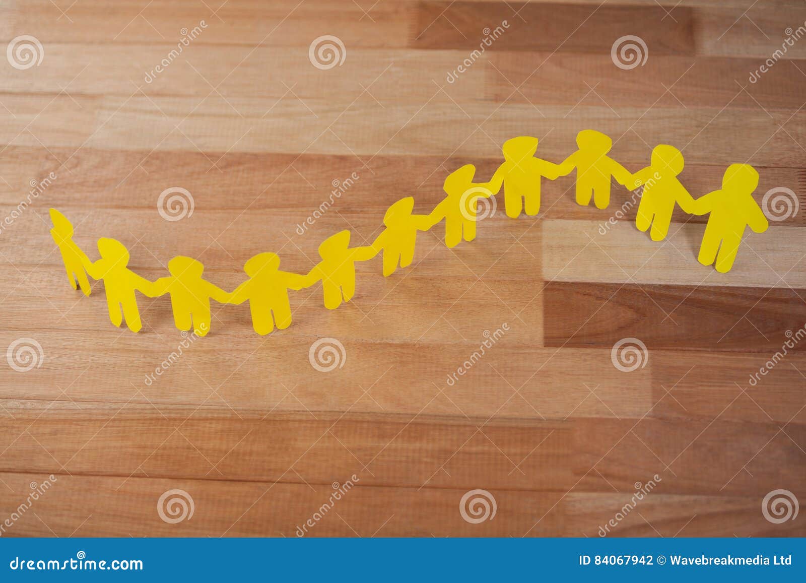 Paper Cut Outs Forming a Human Chain Stock Photo - Image of chain ...