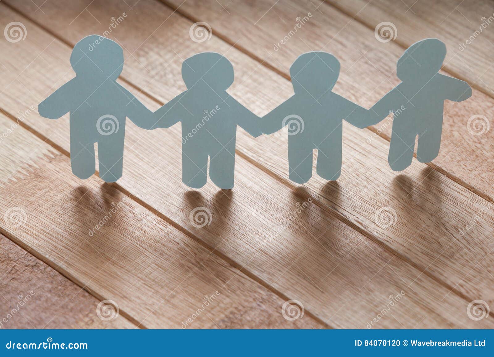 Paper Cut Outs Forming a Human Chain Stock Photo - Image of partnership ...