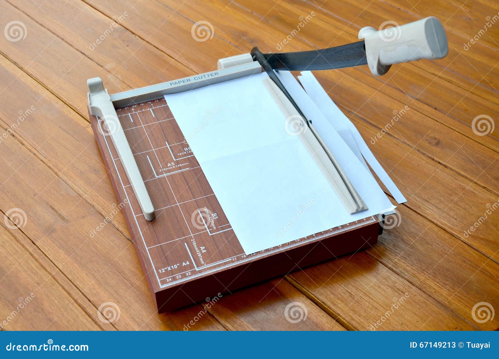 Paper Cutter cutting paper stock image. Image of crop - 67149213