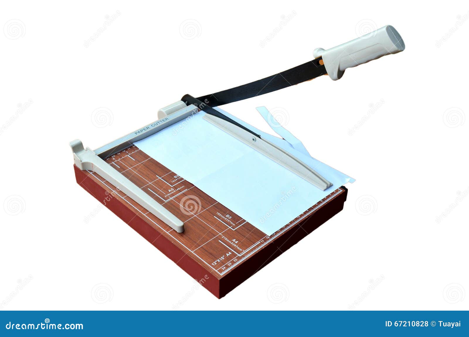 Paper Cutter cutting paper stock photo. Image of hand - 67210828
