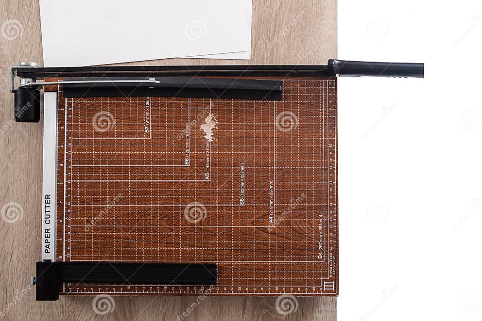 Paper Cutter with Cutting Paper on Table Stock Image - Image of ...