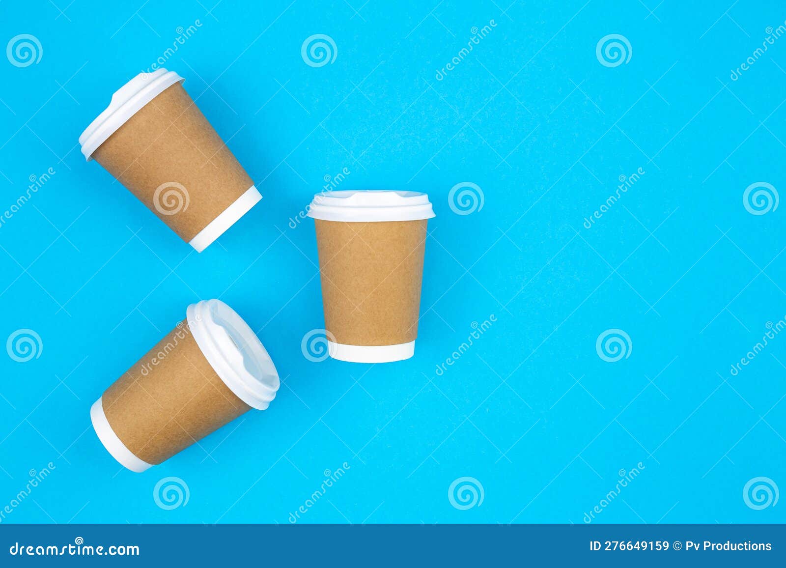 Paper Disposable Cups on a Blue Background, Flat Lay. Stock Image ...