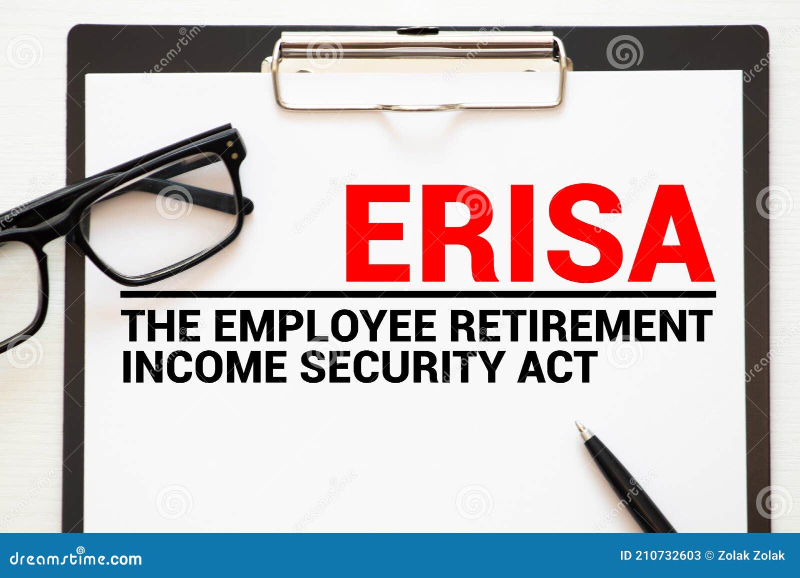 Paper with Employee Retirement Income Security Act ERISA on a Table ...