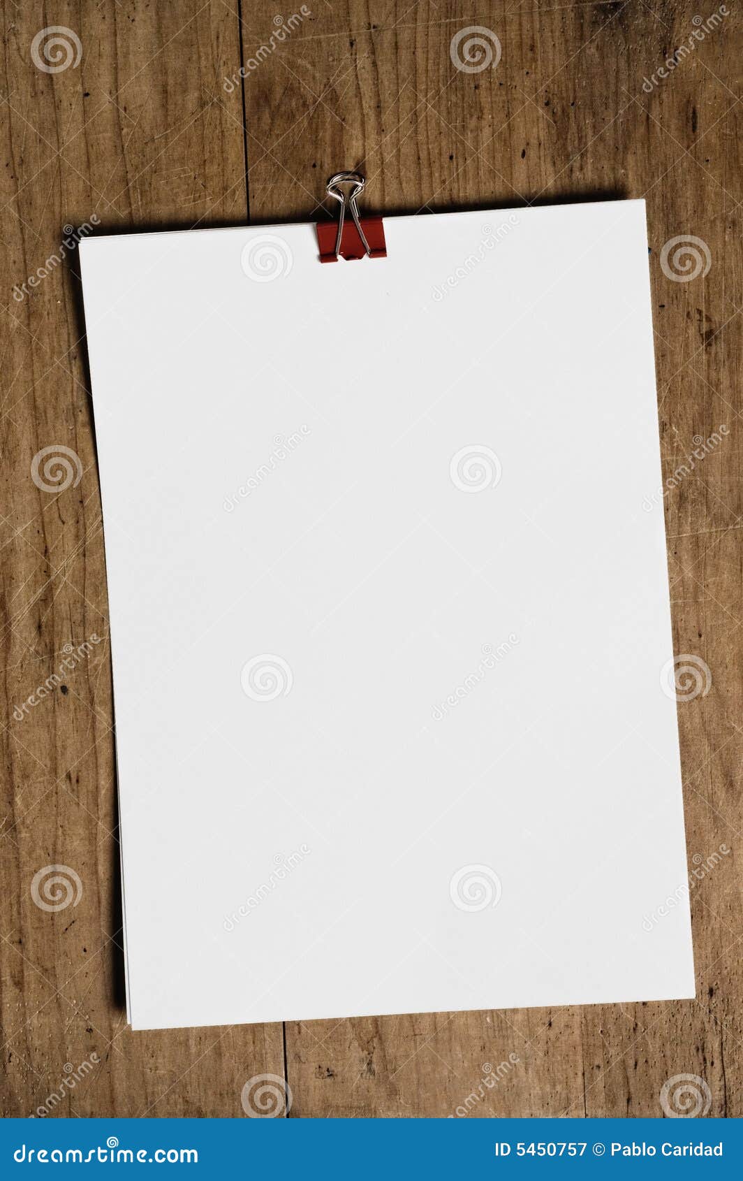 Paper fastened with clip stock image. Image of closeup - 5450757