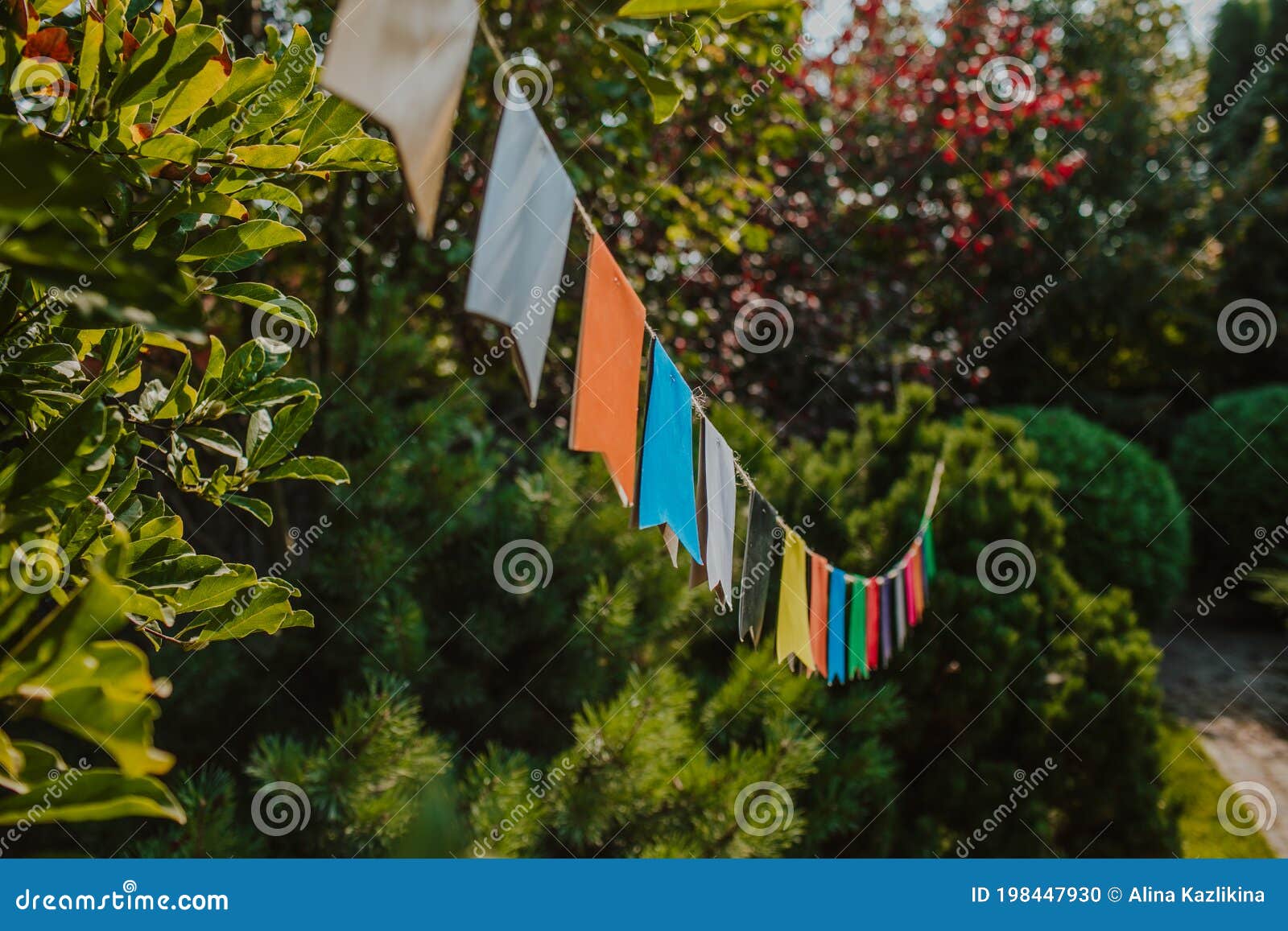 Paper Flags Garland is at the Garden. Copy Space Stock Photo - Image of ...
