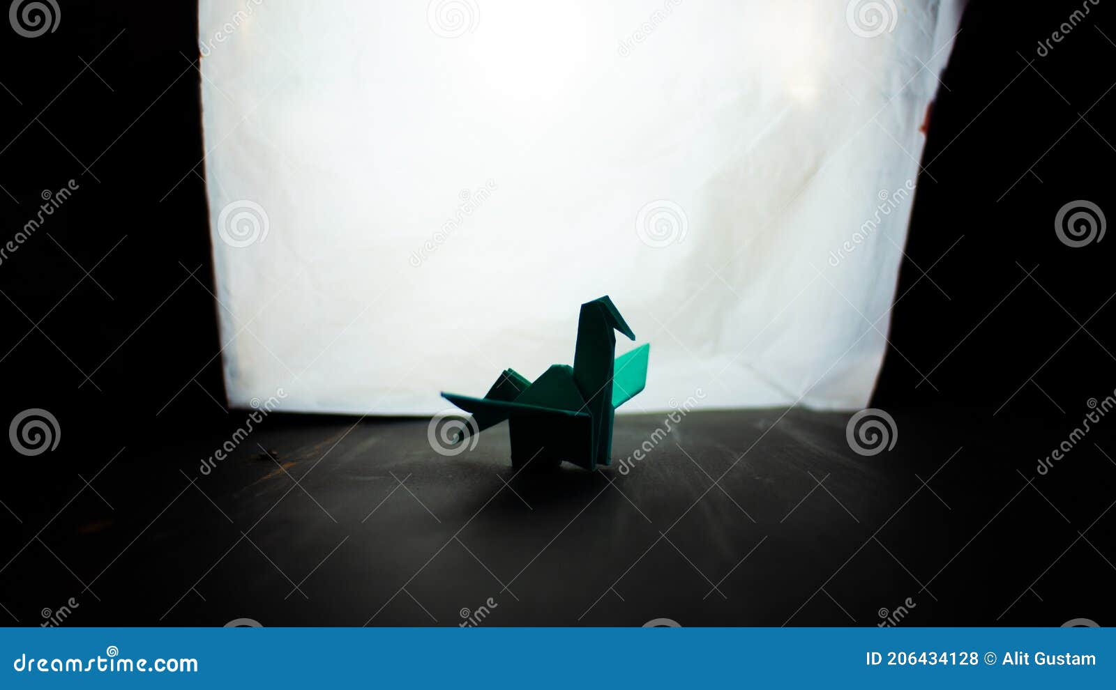 Paper Folding Bird in Back Light Stock Photo - Image of text ...