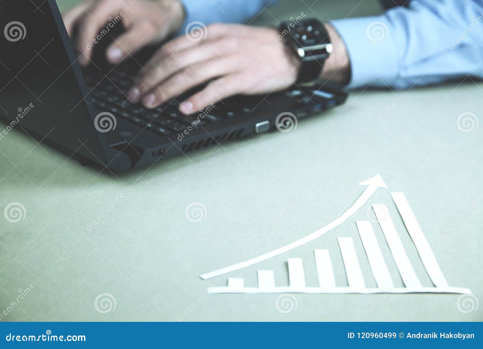 Paper Growth Graph on Desk. Man Using Laptop Stock Image - Image of ...
