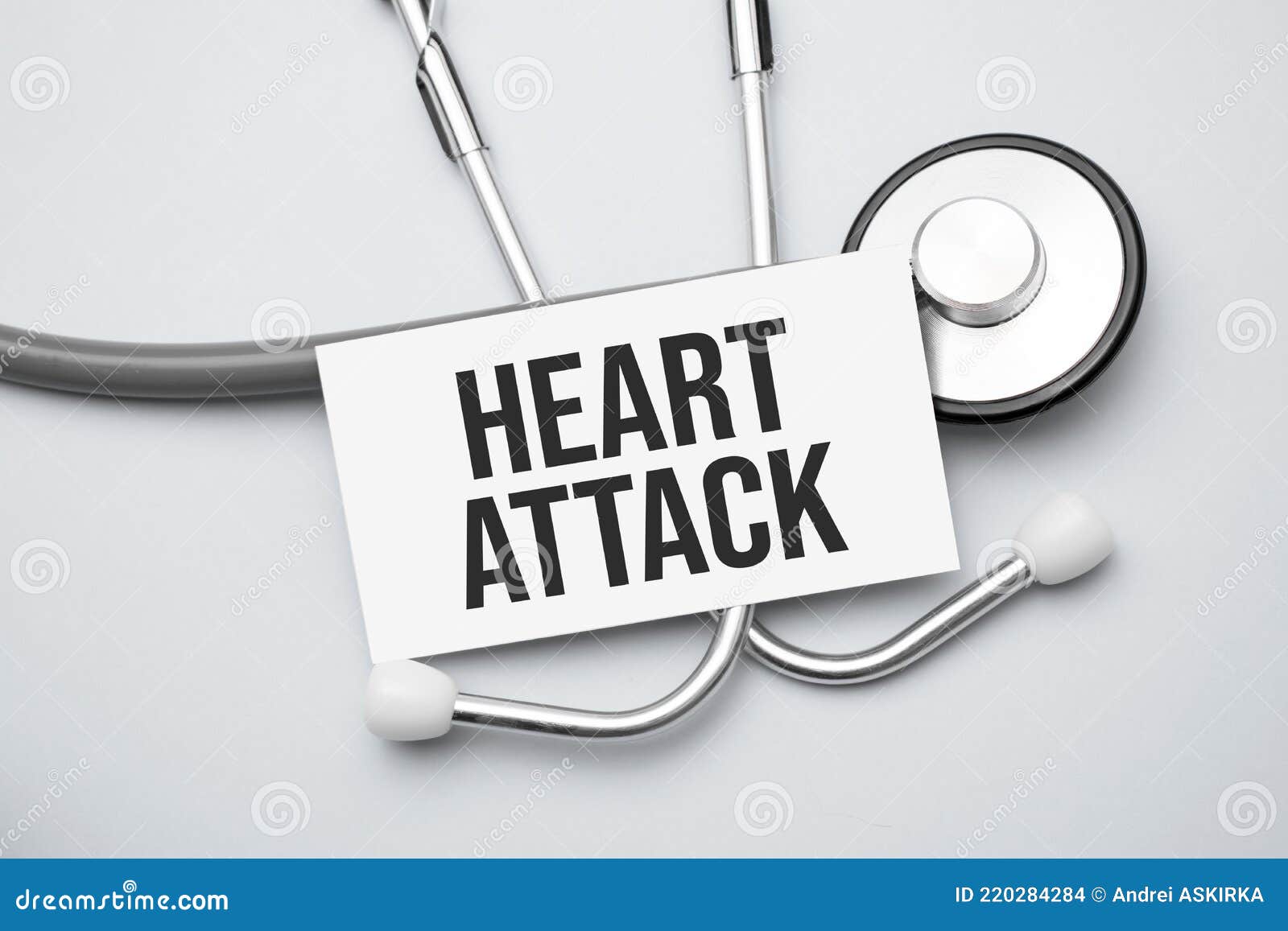 Paper with HEART ATTACK on a Table and Grey Stethoscope Stock Photo ...