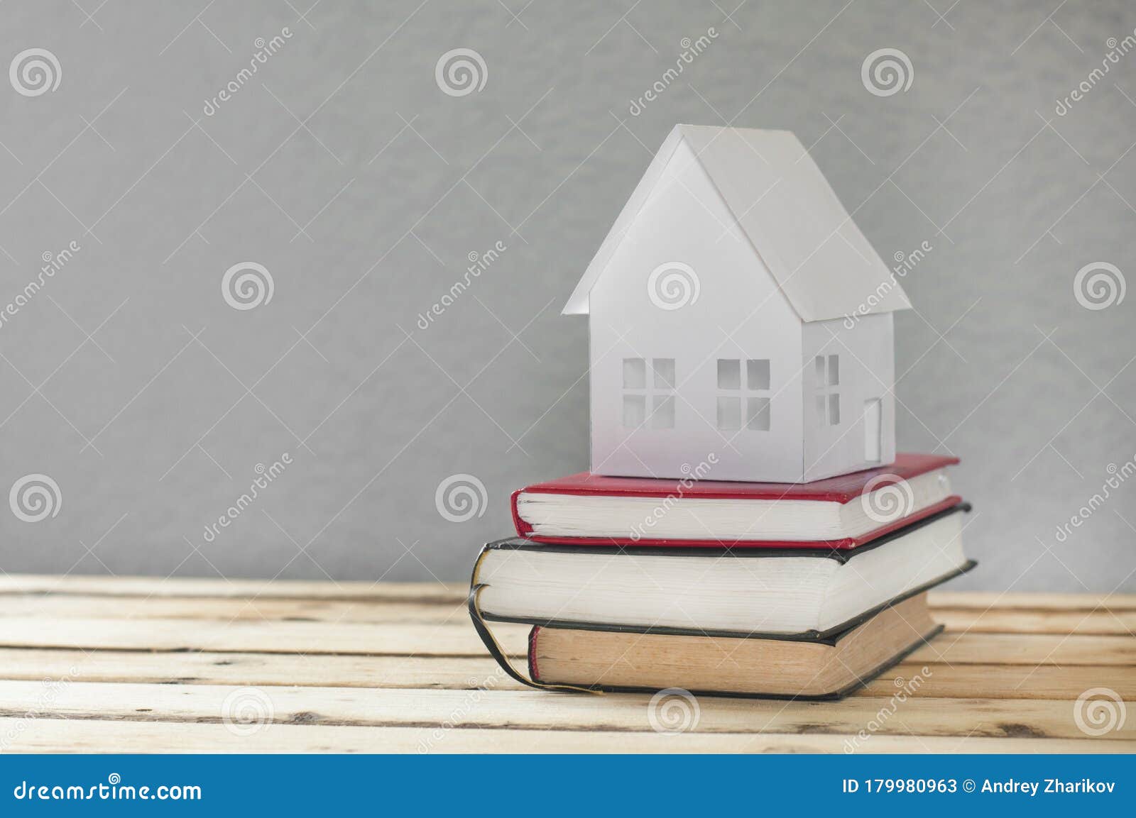 Paper House. a Stack of Books on the Table Stock Image - Image of pile ...