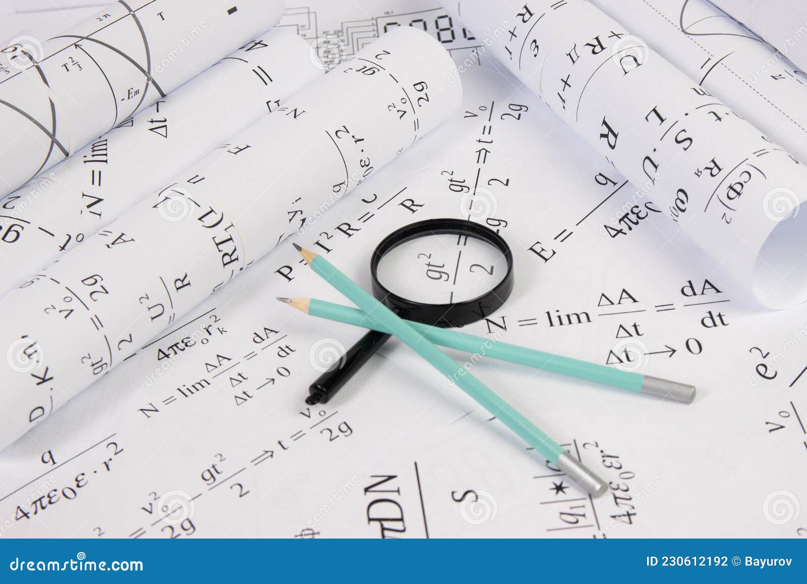 Paper Math Electrical Formulas, Magnifier and Pencils Stock Photo ...