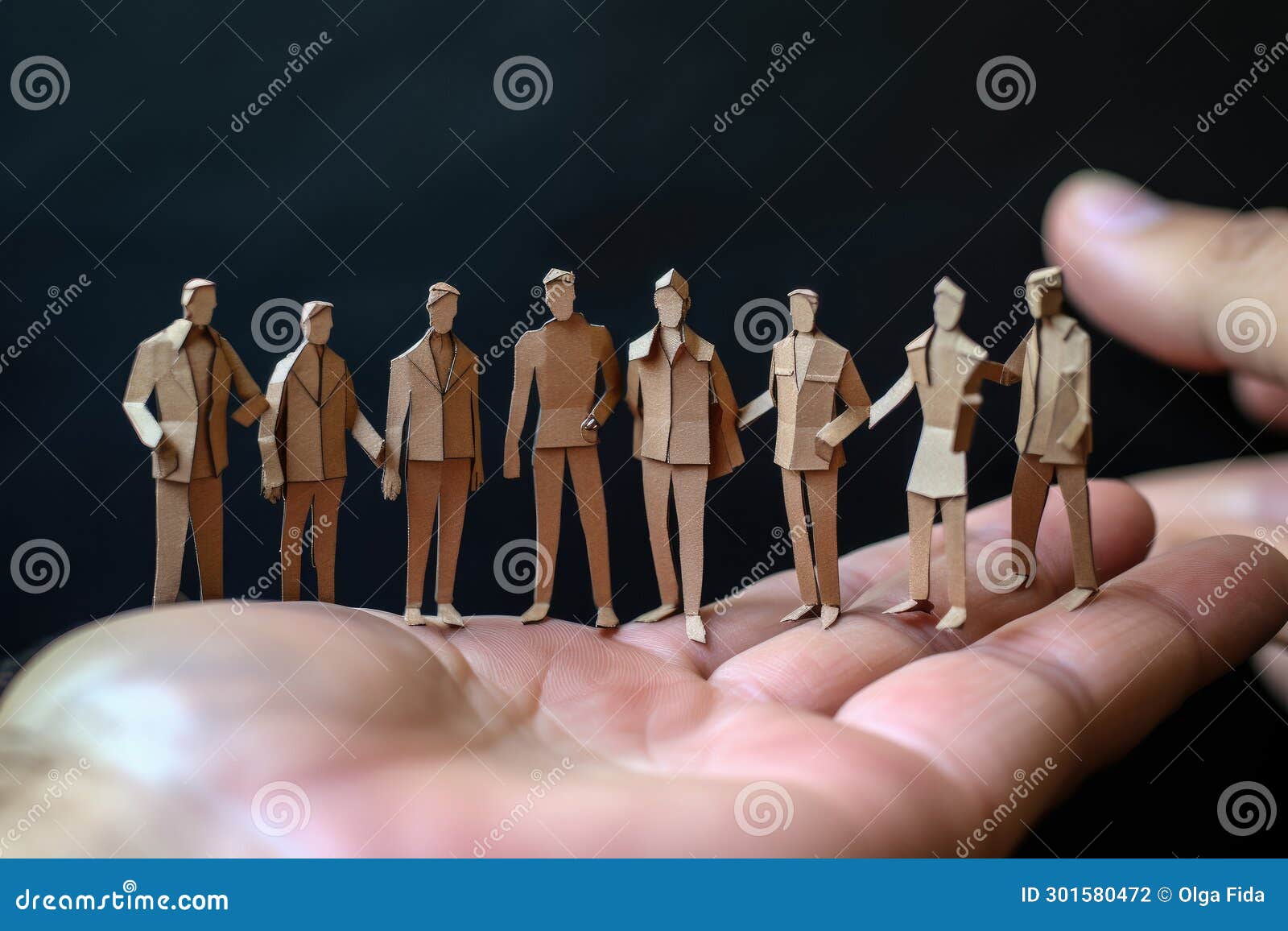 Paper Men Holding Hands. a Symbol of Friendship, Team Stock ...