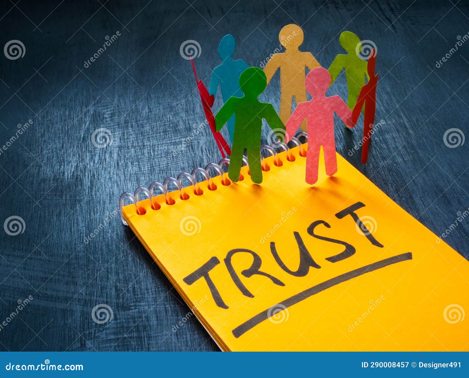 Paper Men and Notepad with the Inscription Trust. Stock Image - Image ...