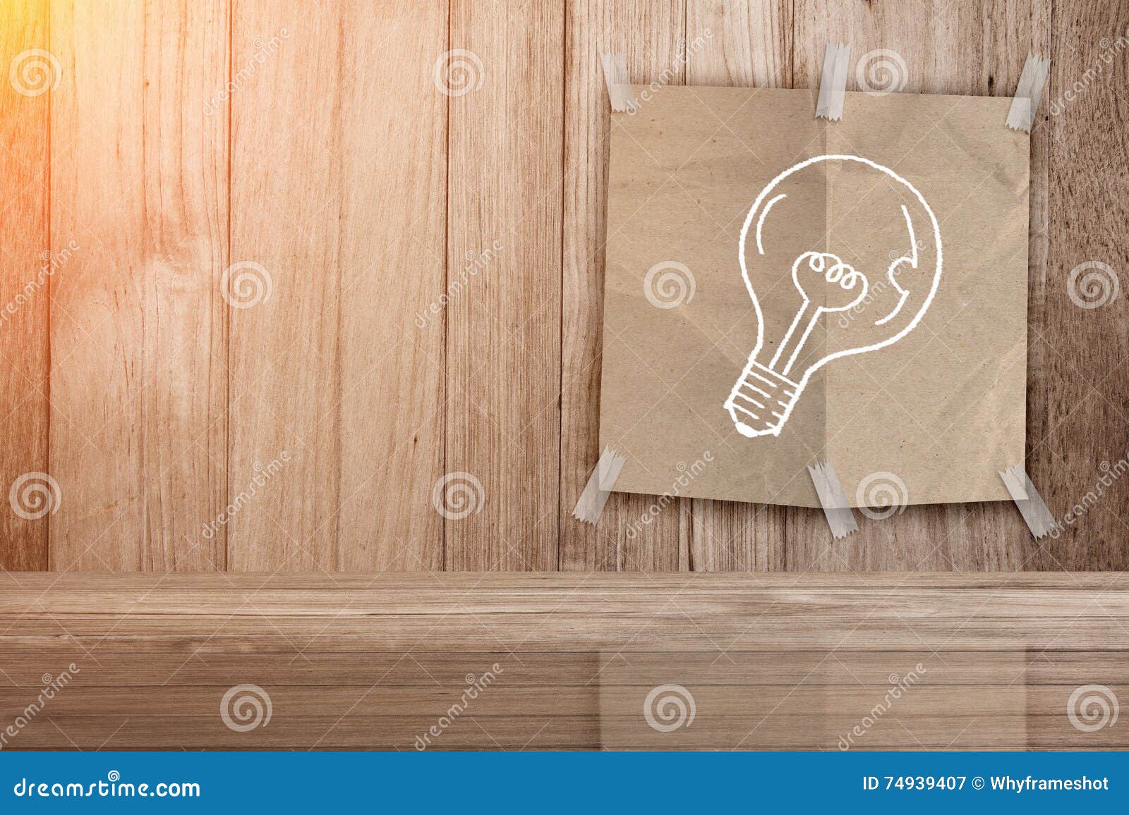 Paper Note with Light Bulb Doodle on Wooden Background Stock Image ...
