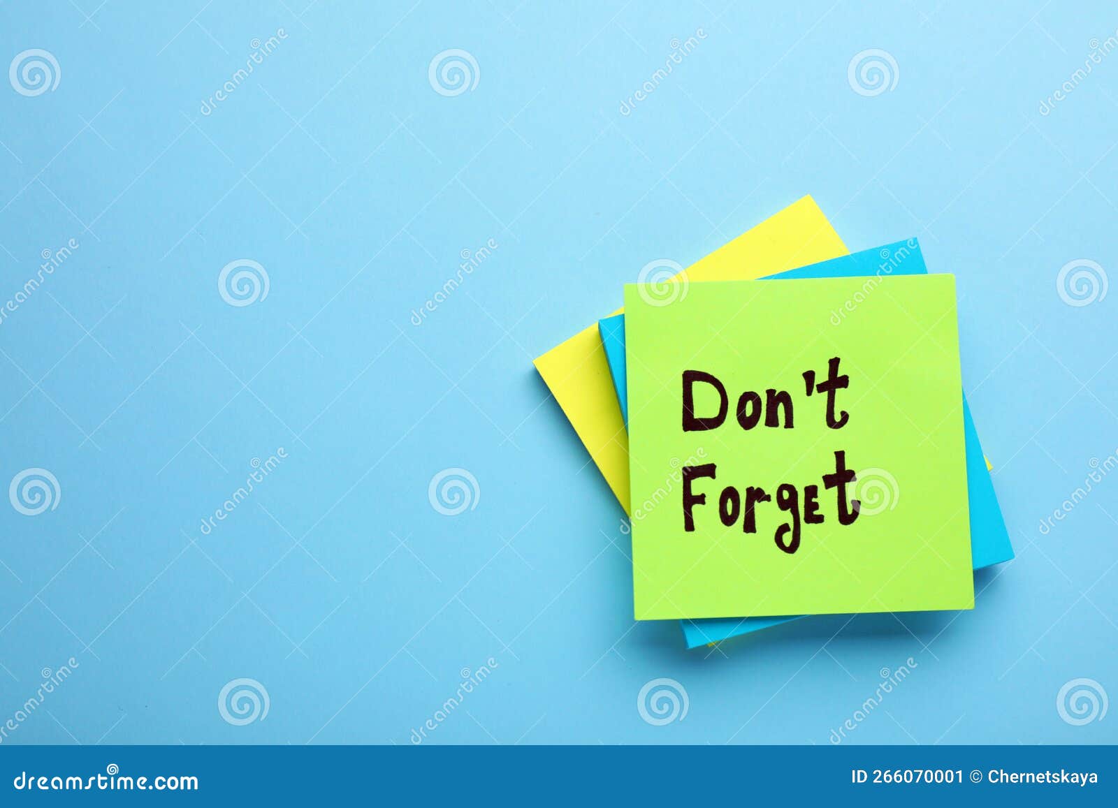 Paper Note with Phrase Don`t Forget on Light Blue Background, Top View ...