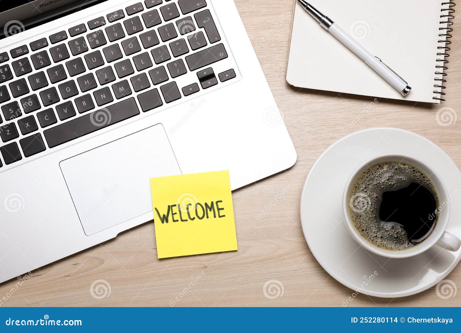 Paper Note with Word Welcome, Laptop, Coffee and Notebook on Wooden ...