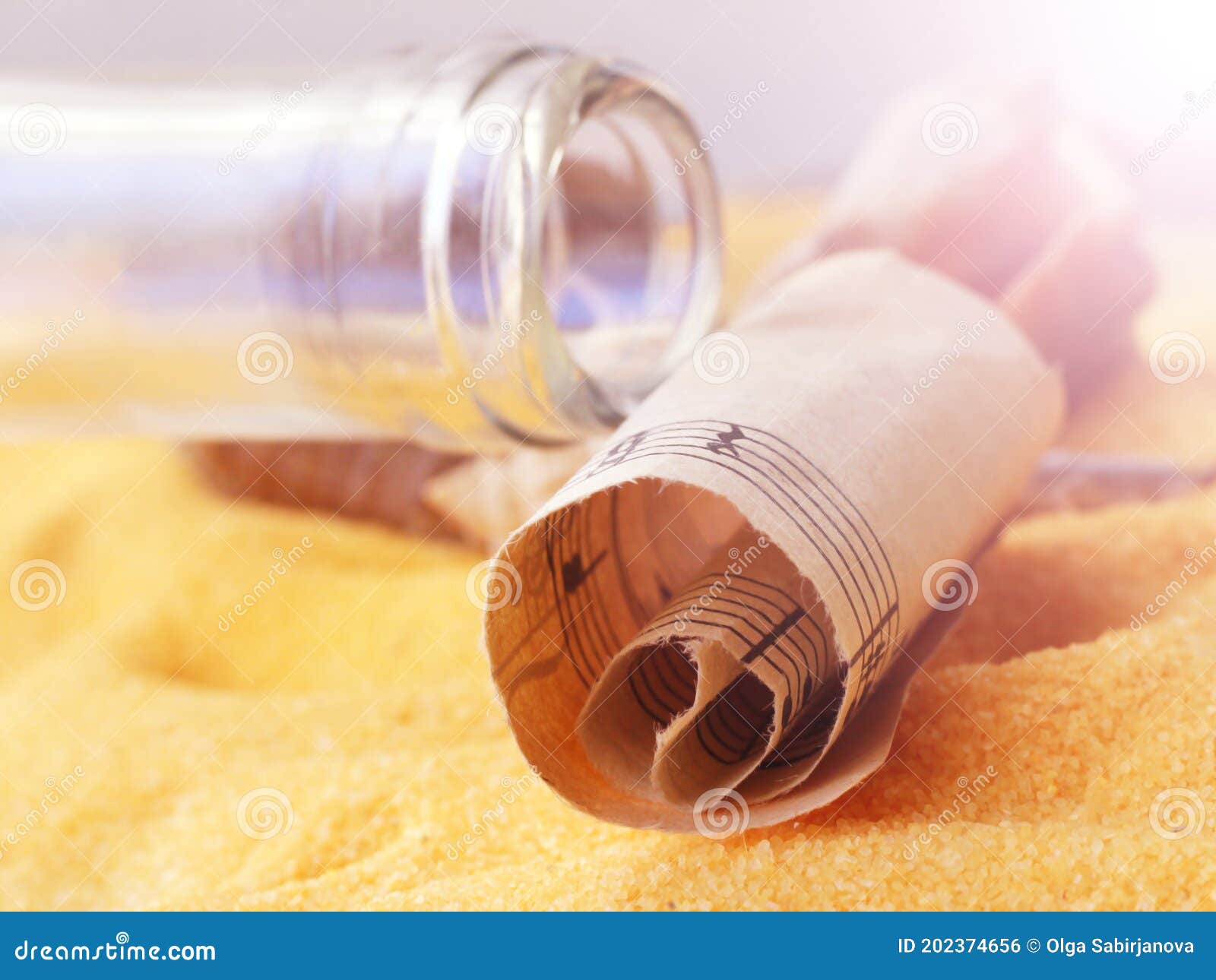 Paper Notes Roll in a Bottle on the Sand Stock Photo - Image of music ...