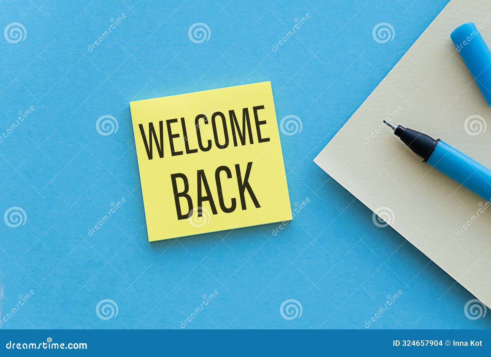 Paper Notes with the Words Welcome Back on Yellow Sticky on Blue Table ...