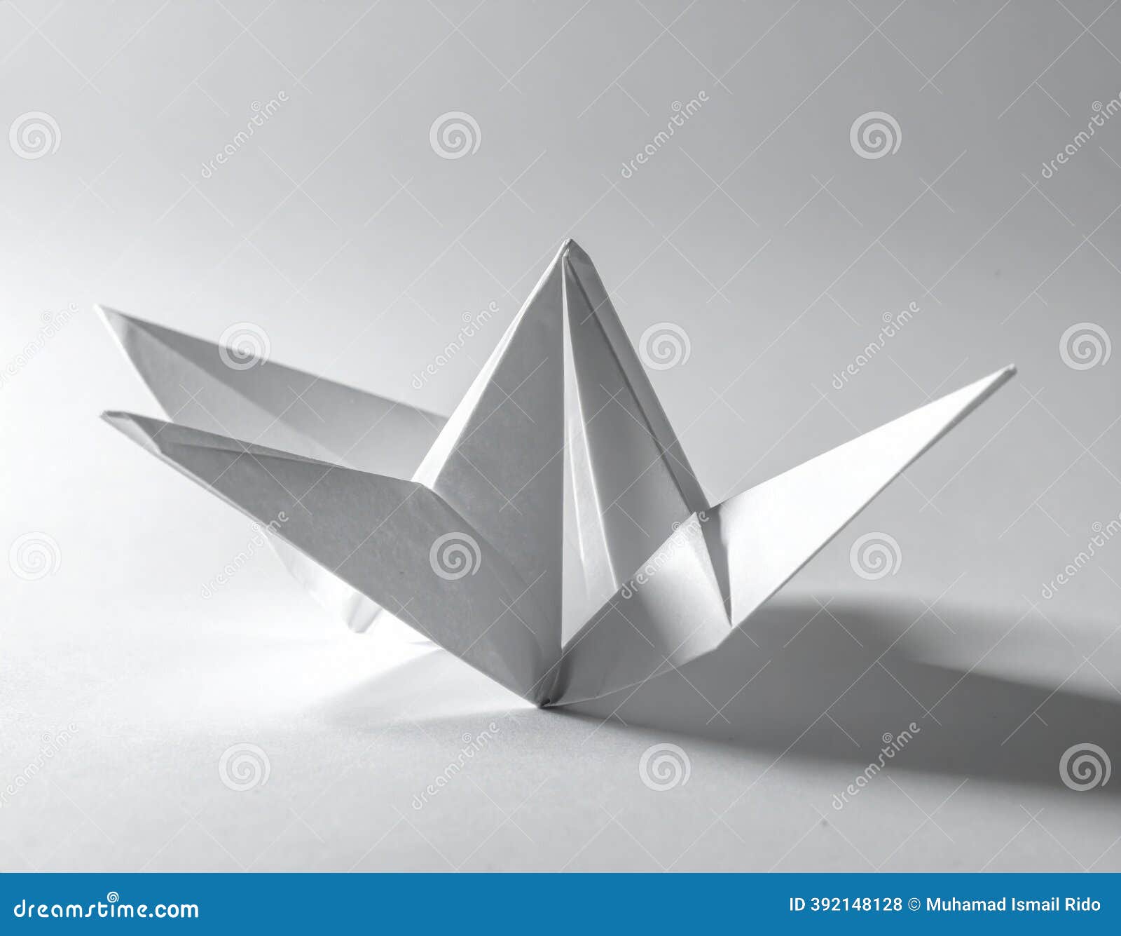 Origami Figure Of A Person Wearing A Hazmat Suit, Crafted From Yellow ...