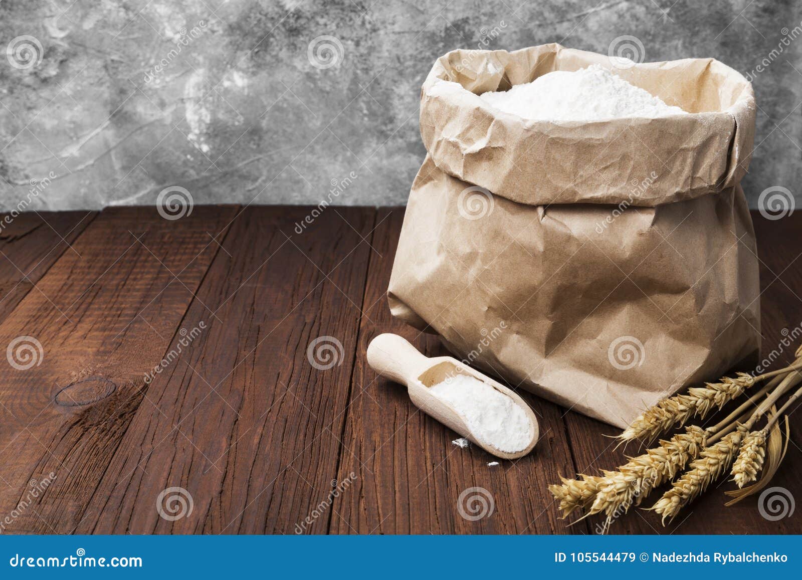 Paper Package of Wheat Flour on a Wooden Background Stock Image - Image ...