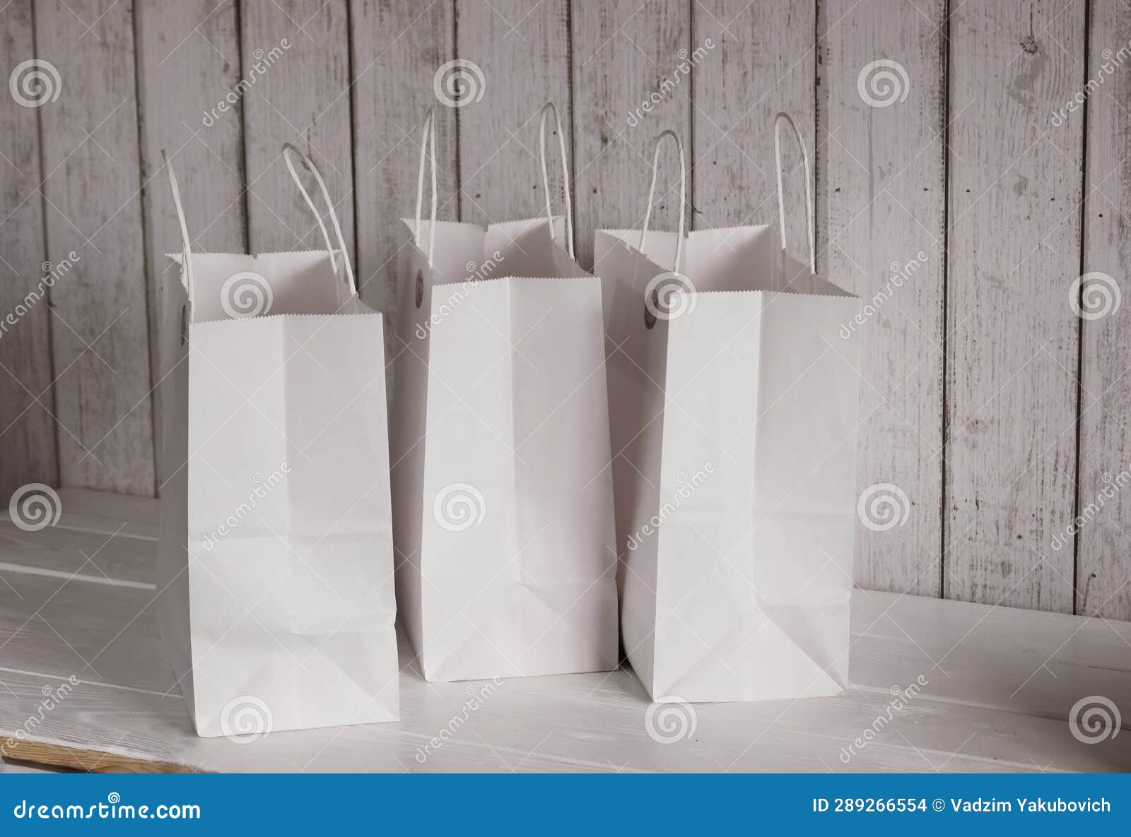 Paper Packages with Gifts. on White Boards Stock Photo - Image of ...