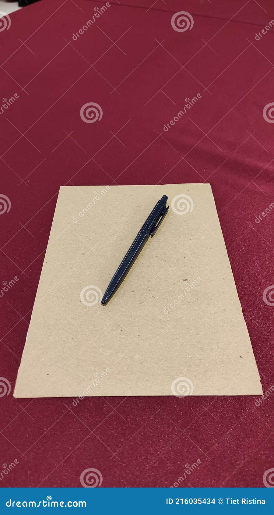 A Paper and a Pen on the Table Stock Photo - Image of paper, writing ...