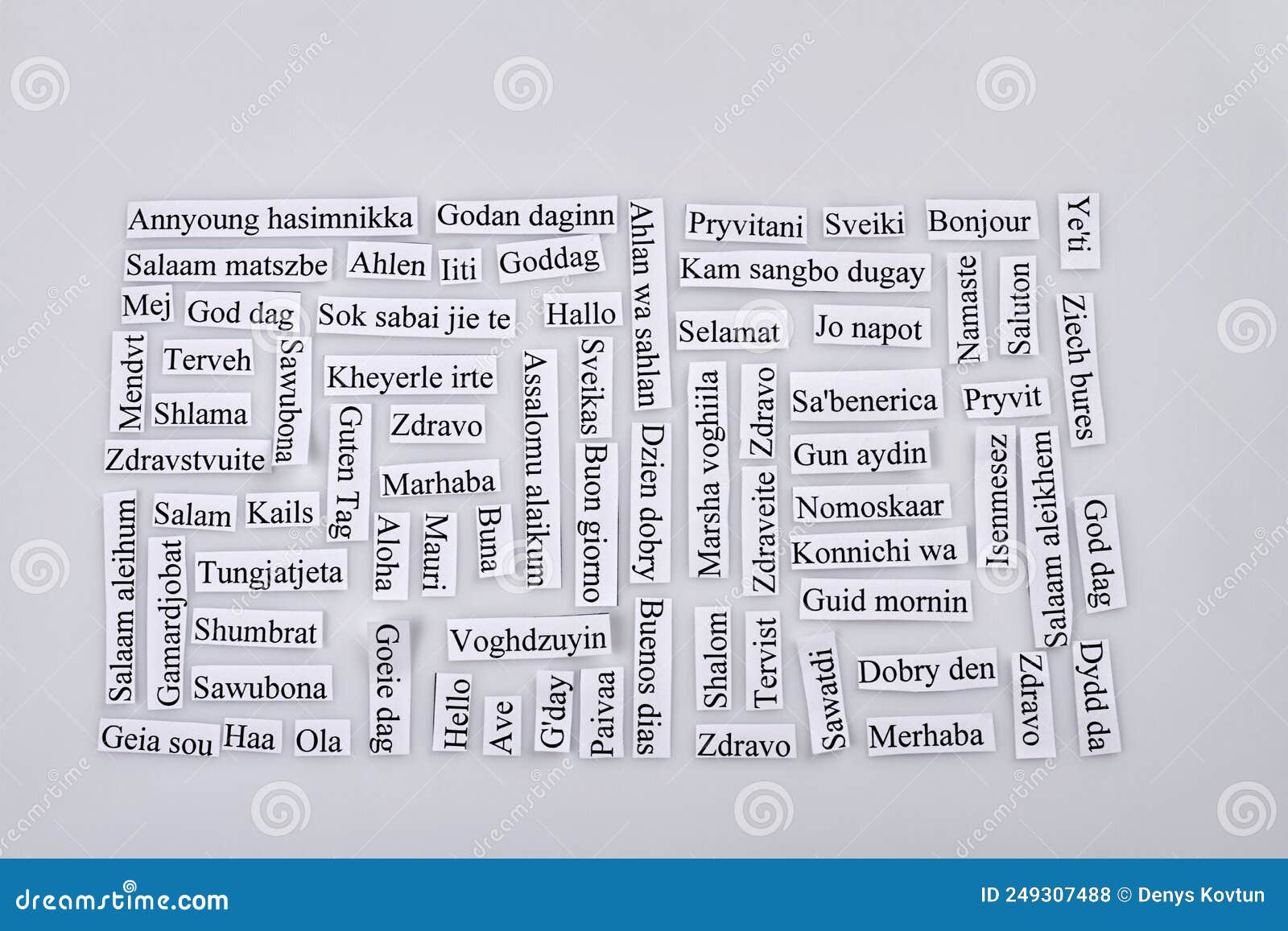 Paper Pieces with Hello Word in Many Different Languages. Stock Photo ...