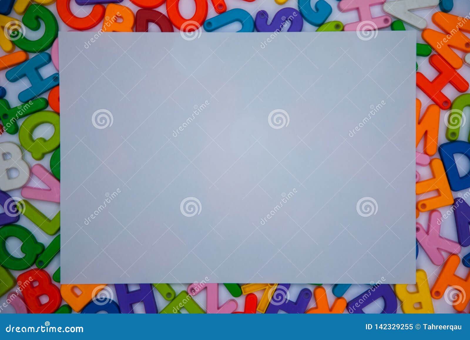 Paper Placed on Alphabet Blocks Stock Image - Image of written, blocks ...