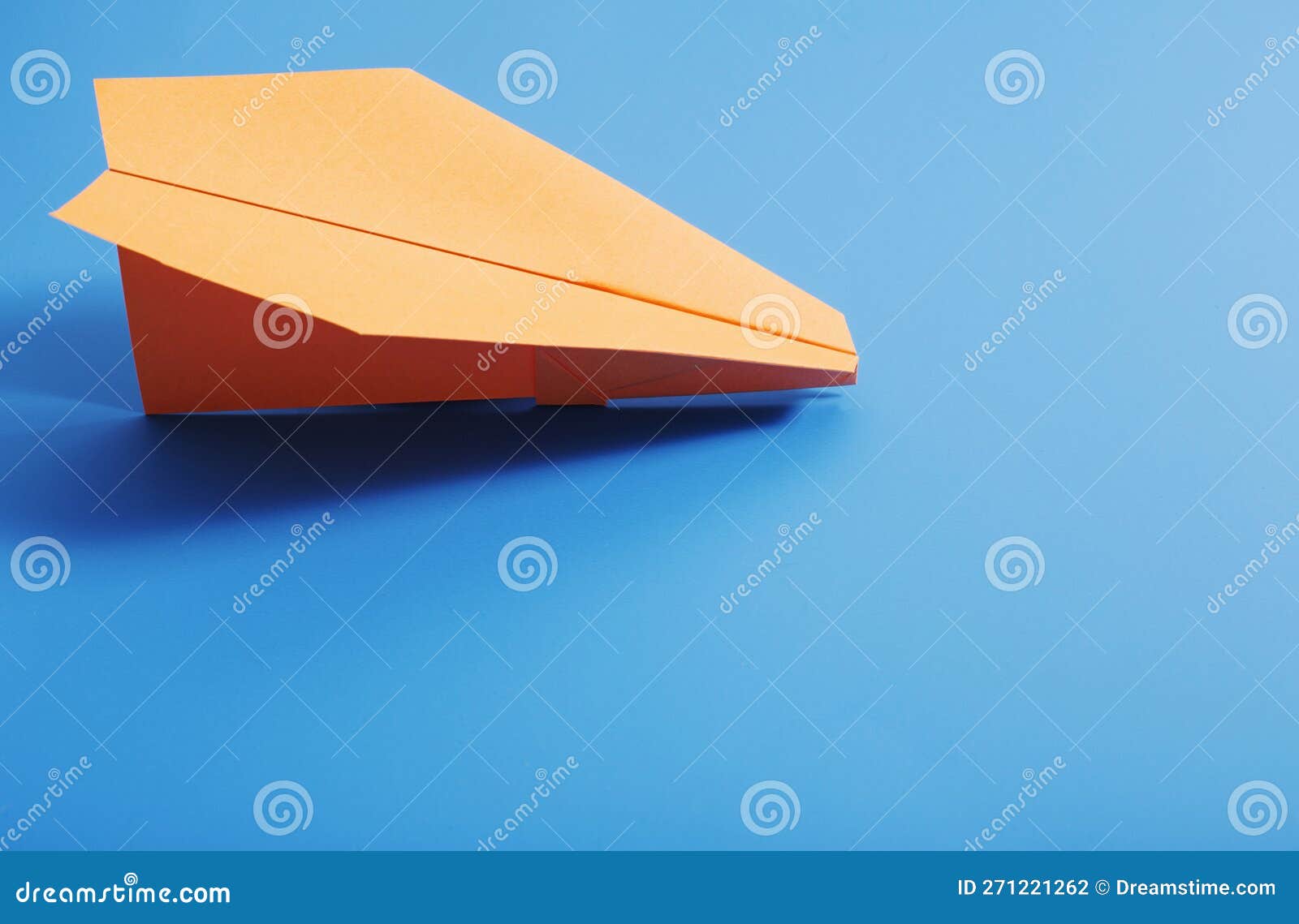 Paper Plane on Blue Color Background Stock Photo - Image of table ...