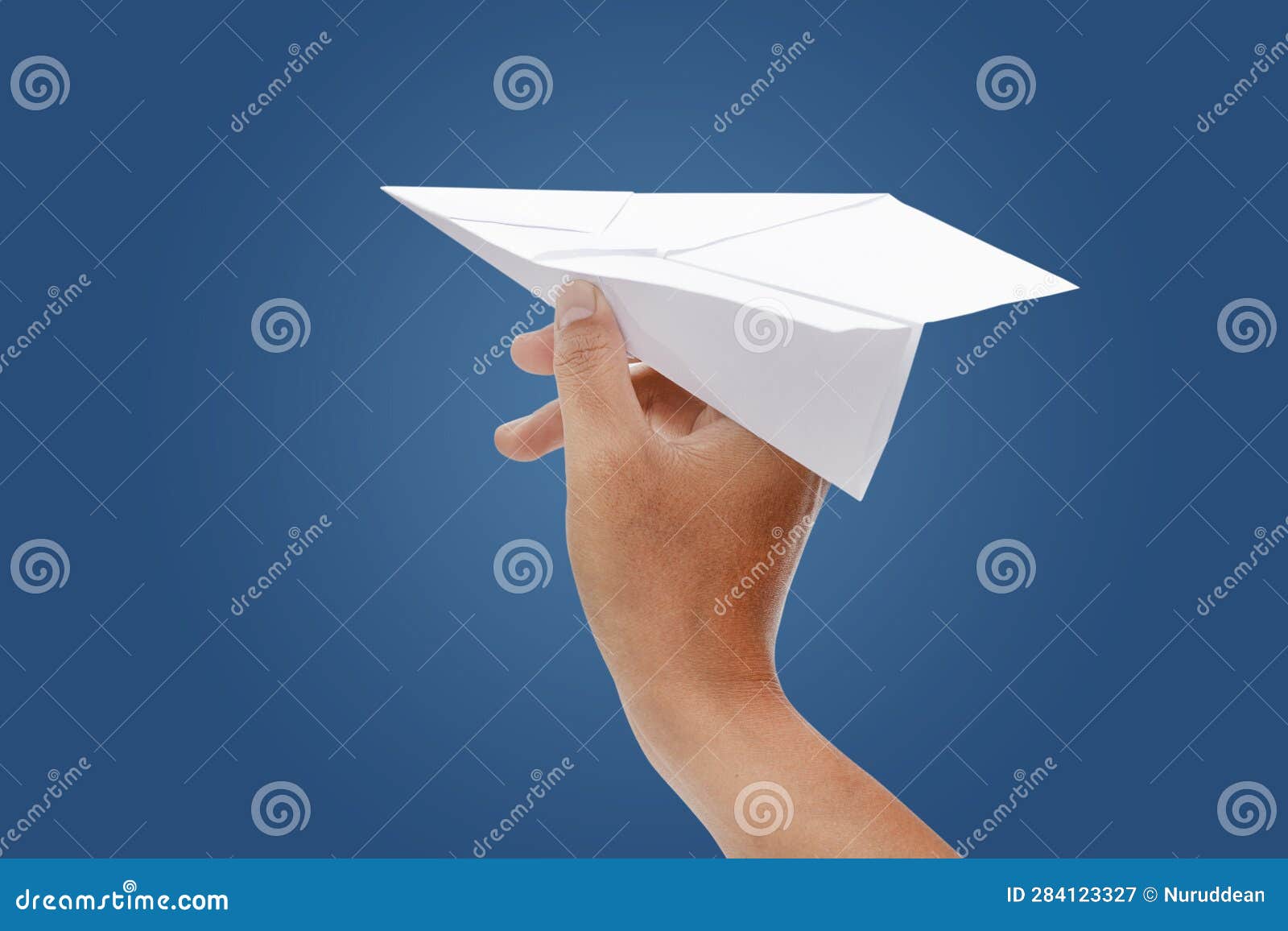 Paper Plane in Hand Isolated on Blue Background - Clipping Paths Stock ...
