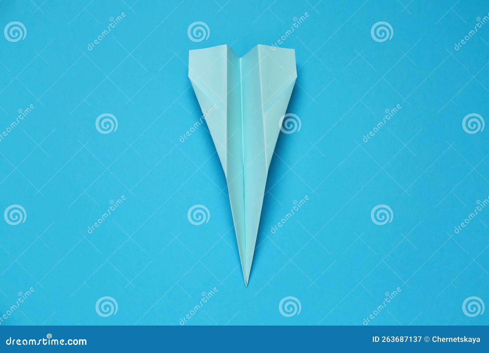 Paper Plane on Light Blue Background, Top View Stock Image - Image of ...