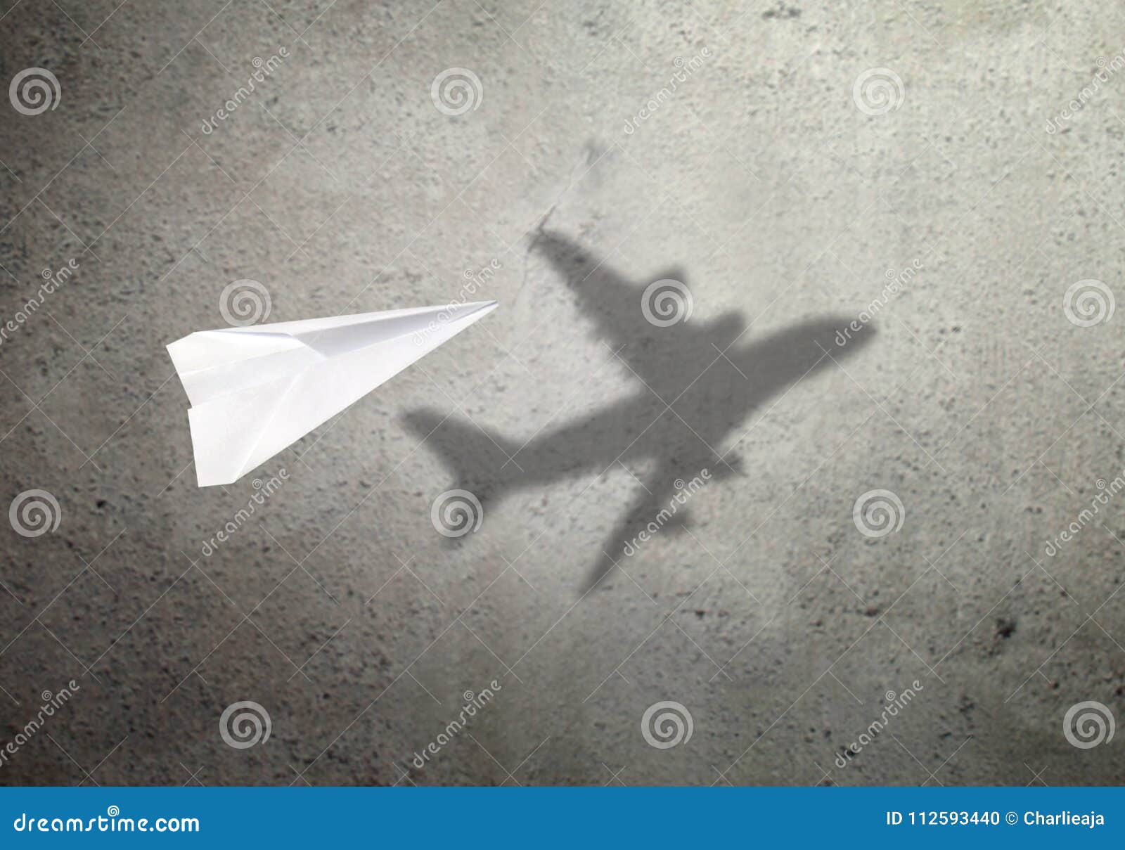Paper plane shadow concept stock photo. Image of promotion - 112593440