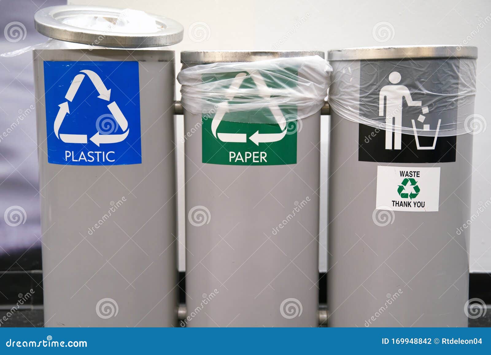 Paper and Plastic Recycling Trash Cans Stock Photo - Image of message ...