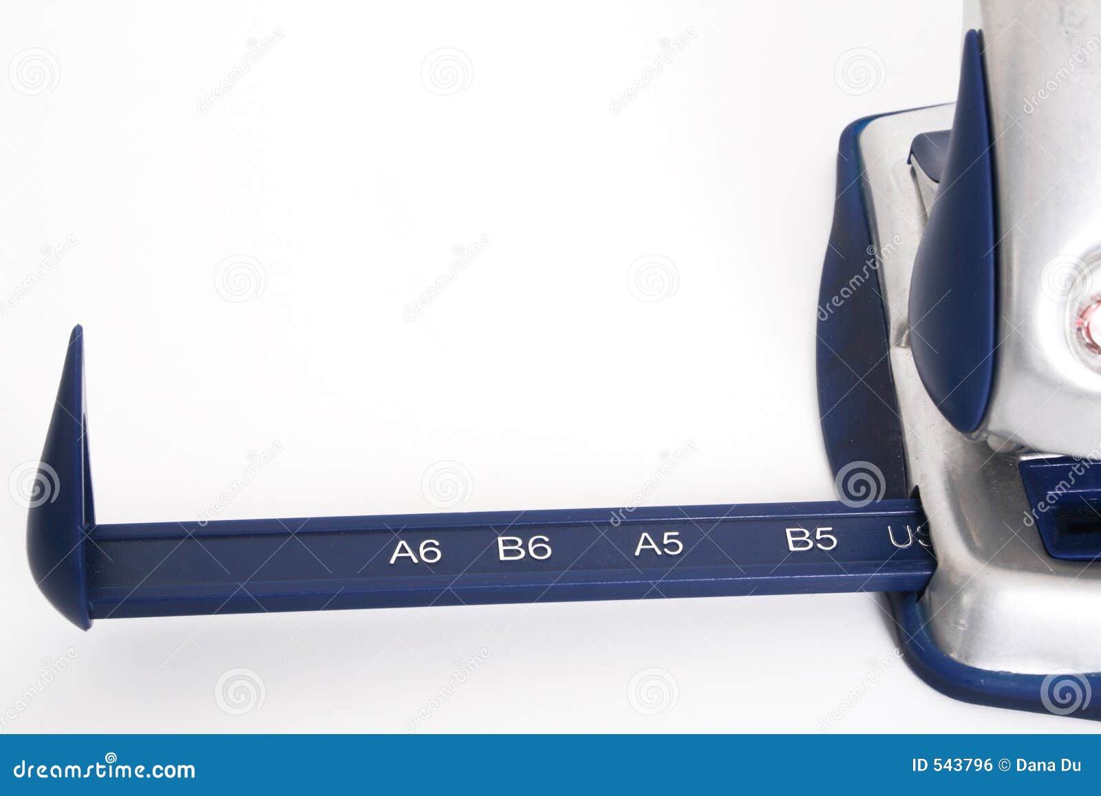 Paper puncher close-up stock photo. Image of silver, papers - 543796