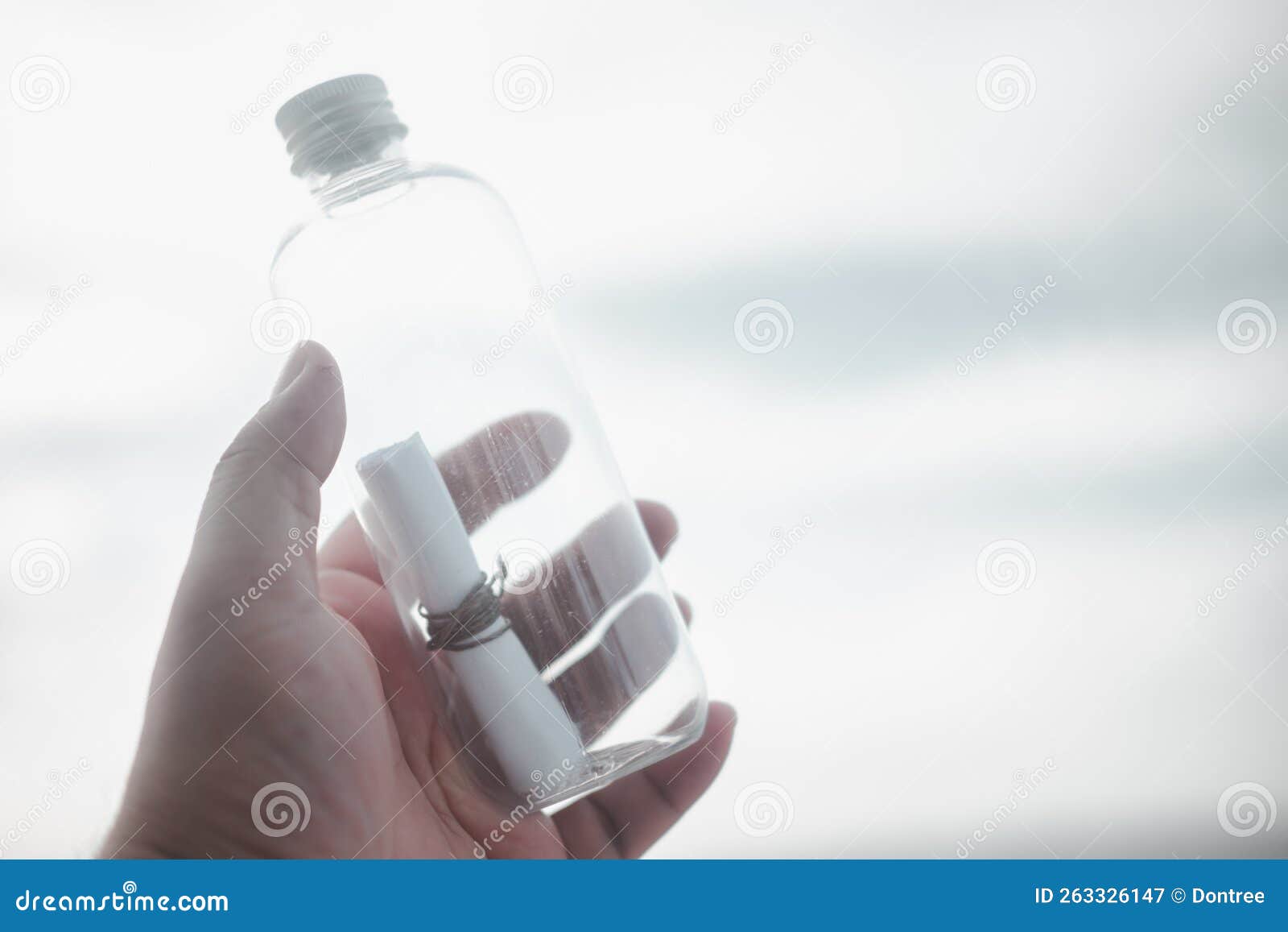 Paper rolled in the bottle stock image. Image of salvation - 263326147