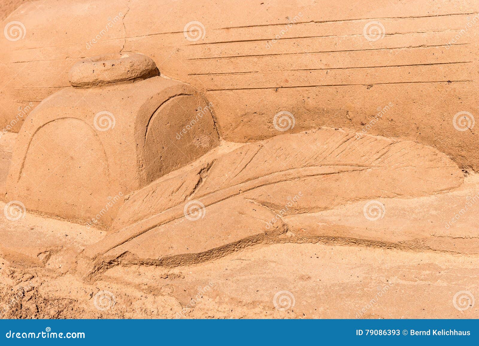 Paper Scroll with Feather Pen and Ink Pot in Sand Stock Image - Image ...