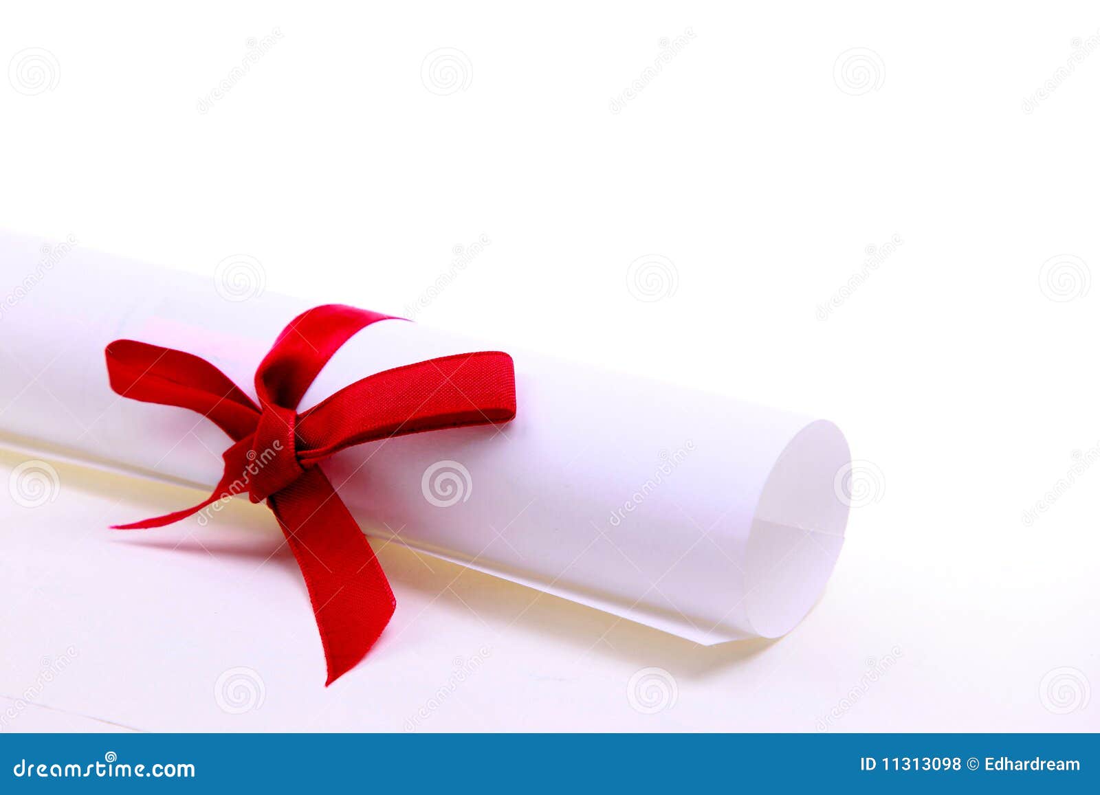 Paper scroll and red bow stock photo. Image of label - 11313098