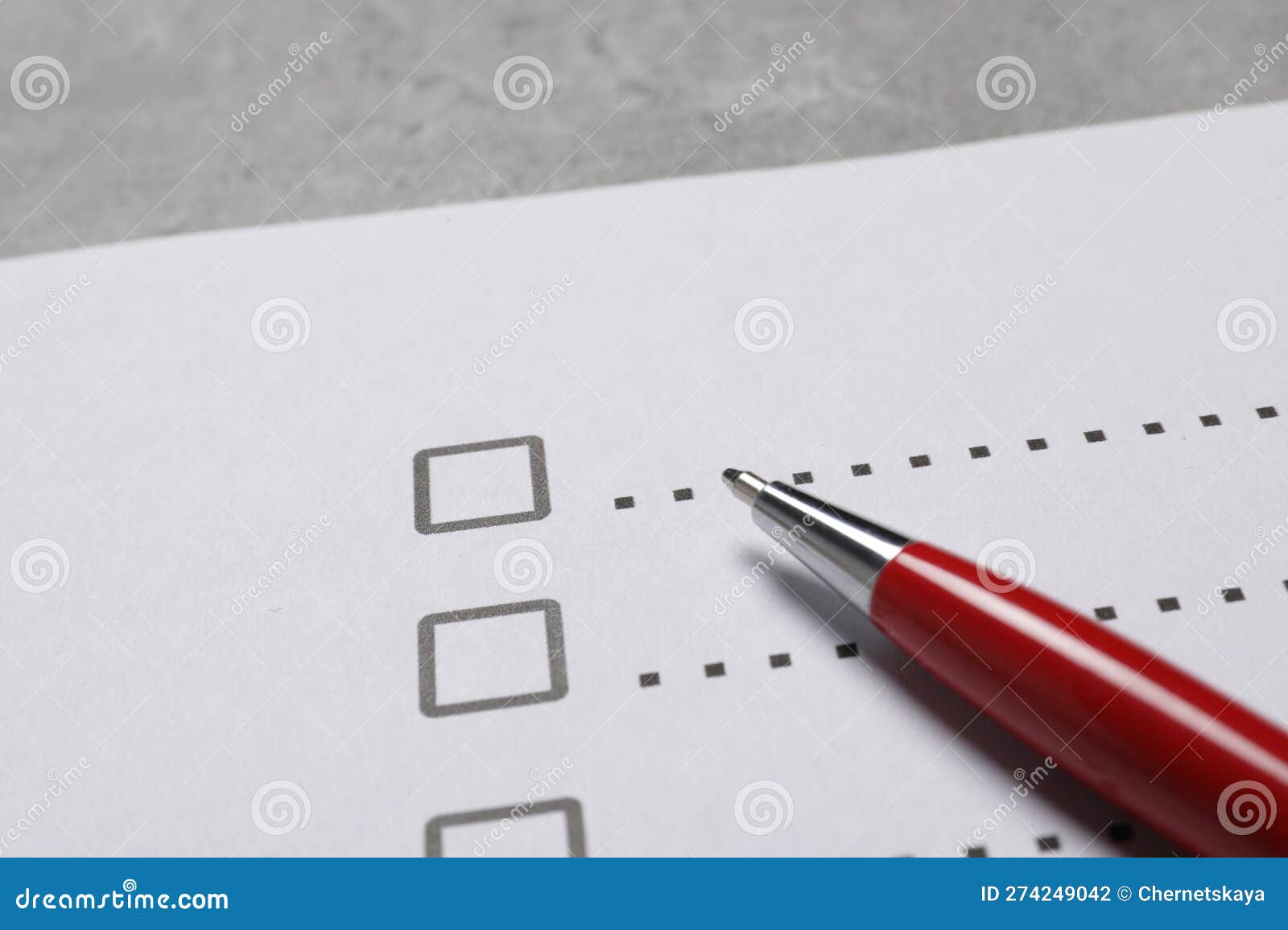 Paper Sheet with Checkboxes and Pen on Light Grey Table, Closeup ...