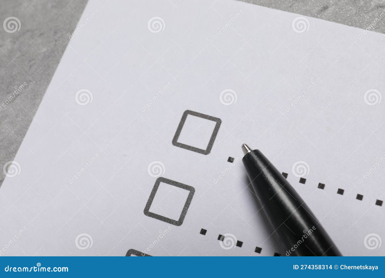 Paper Sheet with Checkboxes and Pen on Light Grey Table, Closeup ...